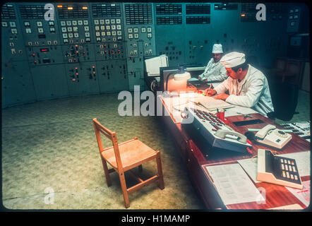 Technicians in a control room of nuclear power station of Tchernobyl ...