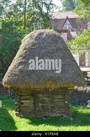 Old traditional Romanian barn or shack under blue sky - this is part of ...