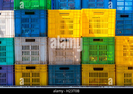 Crates piled up on a delivery van making its rounds Stock Photo - Alamy