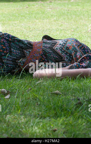 Dead woman laying down on the floor Stock Photo - Alamy