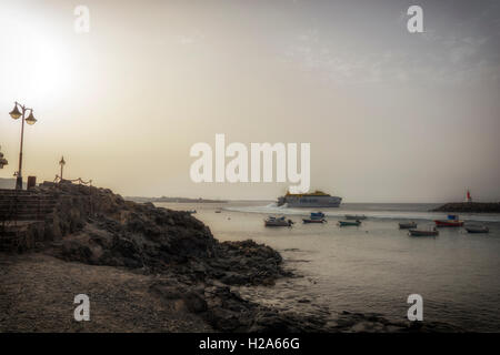 Early morning Playa Blanca at the harbour Stock Photo - Alamy