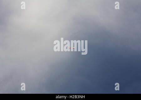 easyjet flying in clouds Stock Photo - Alamy