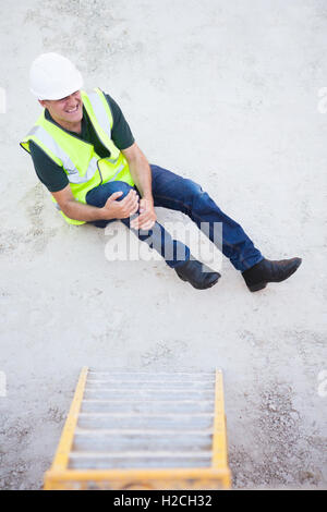 one manual worker man accident falling from ladder in silhouette on ...
