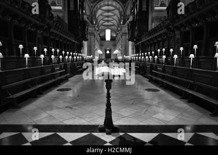 Choir stalls and bible on a wooden carved stand at St. Paul's Cathedral ...