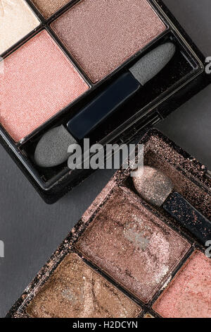 Crushed blush or eye shadow on black background Stock Photo - Alamy