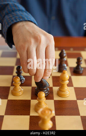 Chess player making a move Stock Photo - Alamy