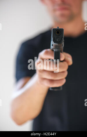 Men with handgun close up Stock Photo - Alamy