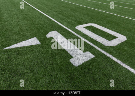 10 yard line on the football field Stock Photo - Alamy