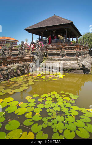Visitors at Kertha Gosa, an iconic pavilion that its ceiling showcasing ...