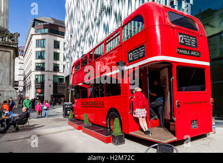 Routemaster Bus Bar Outside The Monument, London, UK Stock Photo - Alamy