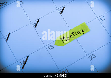 Setting a meeting date on calendar Stock Photo - Alamy