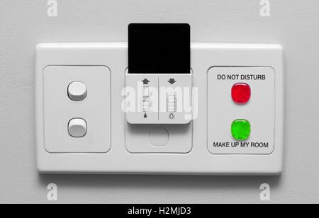 hotel room electric switches with card Stock Photo - Alamy