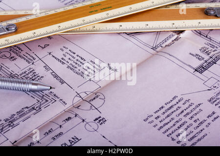 Drawing equipment on detailed architects house plans Stock Photo - Alamy