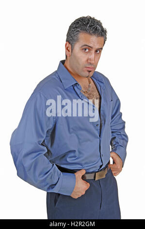 Picture of a serious business man posing isolated over grey wall ...