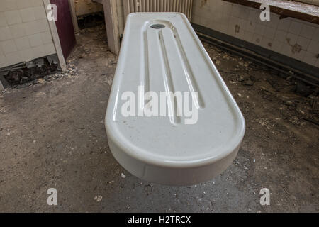An increasingly rare porcelain autopsy table within the derelict Maiden ...