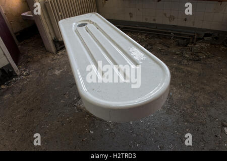 An increasingly rare porcelain autopsy table within the derelict Maiden ...