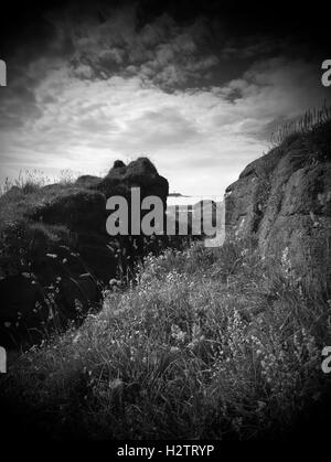 Pladda Island lighthouse in the distance, seen through a hole in the ...