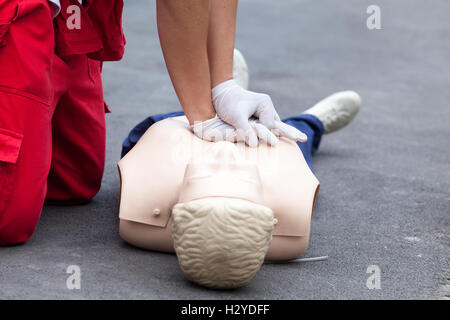 First aid training. Cardiac massage. Cardiopulmonary resuscitation ...