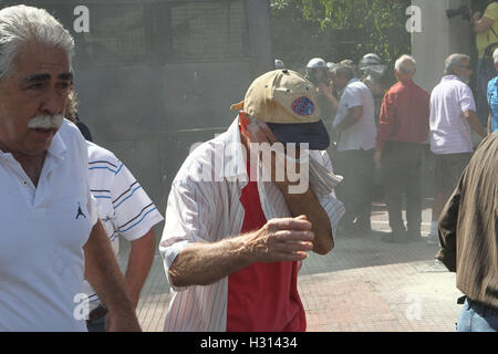 People clash with riot police during a demonstration in Santiago, Chile ...