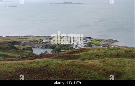 Elevated view of Cullipool on Isle of Luing with islands including ...