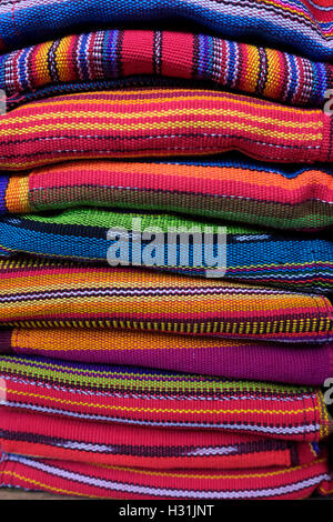 A display of tzutes or traditional utility cloths for sale at the ...
