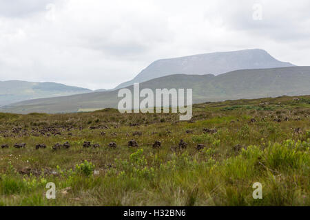 Irish landscape with Turf banks, in Donegal County, Ireland Stock Photo ...