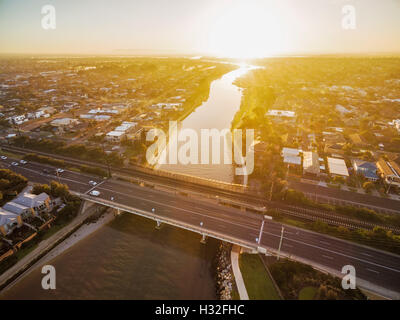 Aerial view of Patterson Lakes suburb and Nepean Highway at sunrise ...