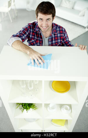 Man husband cleaning the house helping wife Stock Photo - Alamy