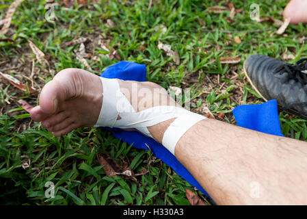 Shin pain, injury and accident of a soccer player playing a match or ...