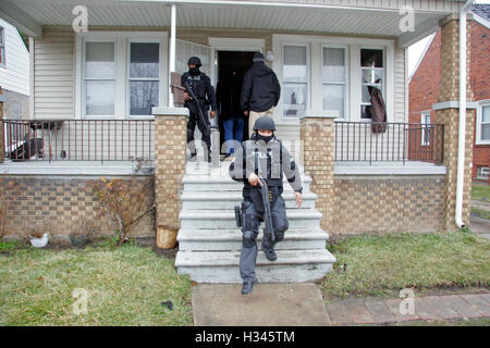 Detroit police officers raid a house in Detroit, Michigan, USA Stock ...