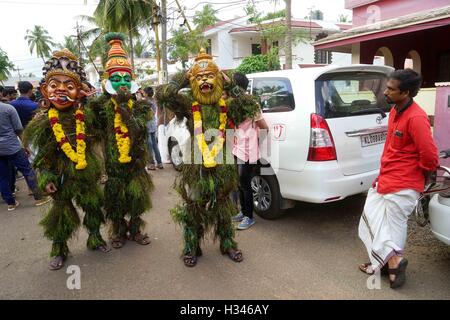 Traditional Kummatti dancers wear colourful wooden masks various Indian ...