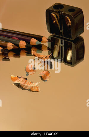 Eye pencils, sharpener and their reflection in the mirror Stock Photo ...