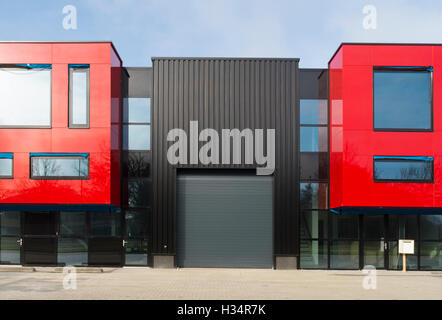 newly build modern red warehouse with offices Stock Photo: 87286636 - Alamy