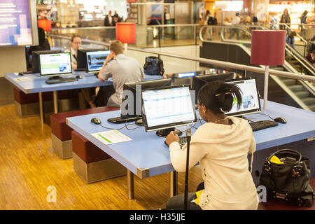 At computer terminals at terminal at Schipol Airport,Amsterdam,Holland ...