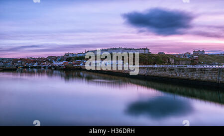 View to Whitby Harbour at sunset from the 199 steps leading from The ...