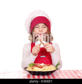 Adorable little girl eating spaghetti in outdoors restaraunt Stock ...