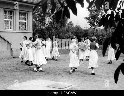 Girls of League of German Girls (BDM) practicing gymnastics, 1939 Stock ...