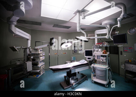 Interior view of operating room with equipment and medical devices in ...