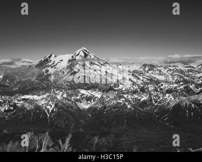 Aerial view of the Redoubt Volcano, shrouded in the clouds, with ...