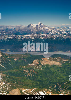 Aerial view of the Redoubt Volcano, shrouded in the clouds, with ...