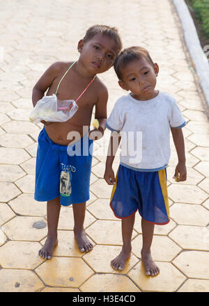 Two hungry street children boys living in poverty are in need of food ...