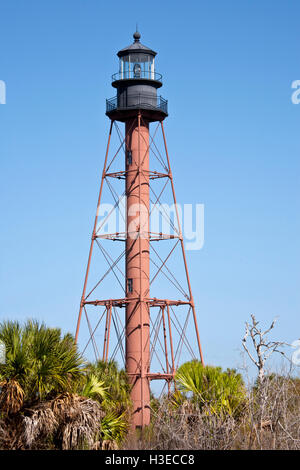 The skeletal square pyramidal brown tower of Anclote Key Lighthouse ...