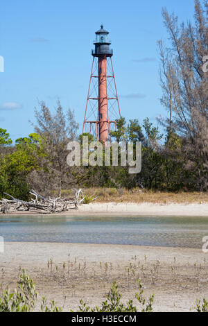 The skeletal square pyramidal brown tower of Anclote Key Lighthouse ...