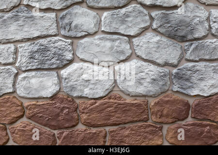 Wall external finish of the blocks and bricks country house Stock Photo ...