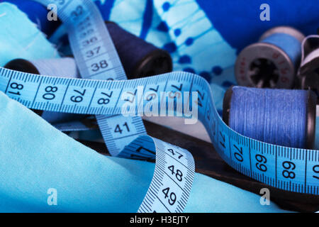 Shades of blue with sewing equipment on a red background Stock Photo ...