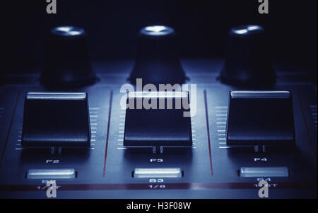 Details of a modern midi controller, view on sliders and knobs Stock ...