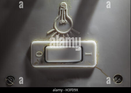 Old dirty plastic light switch and damaged wall Stock Photo - Alamy