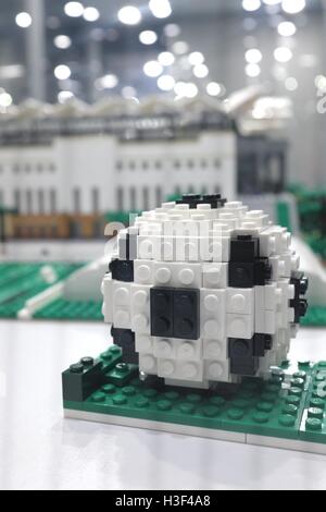 Plastic toy blocks on black background Stock Photo - Alamy