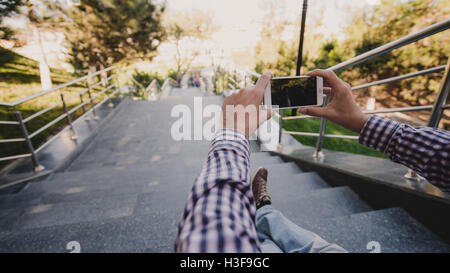 Close-up of a hand taking photos Stock Photo - Alamy
