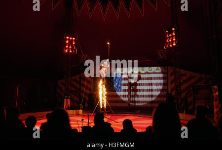 A sword balancing act at Circus Vegas at Whitley Bay Stock Photo - Alamy